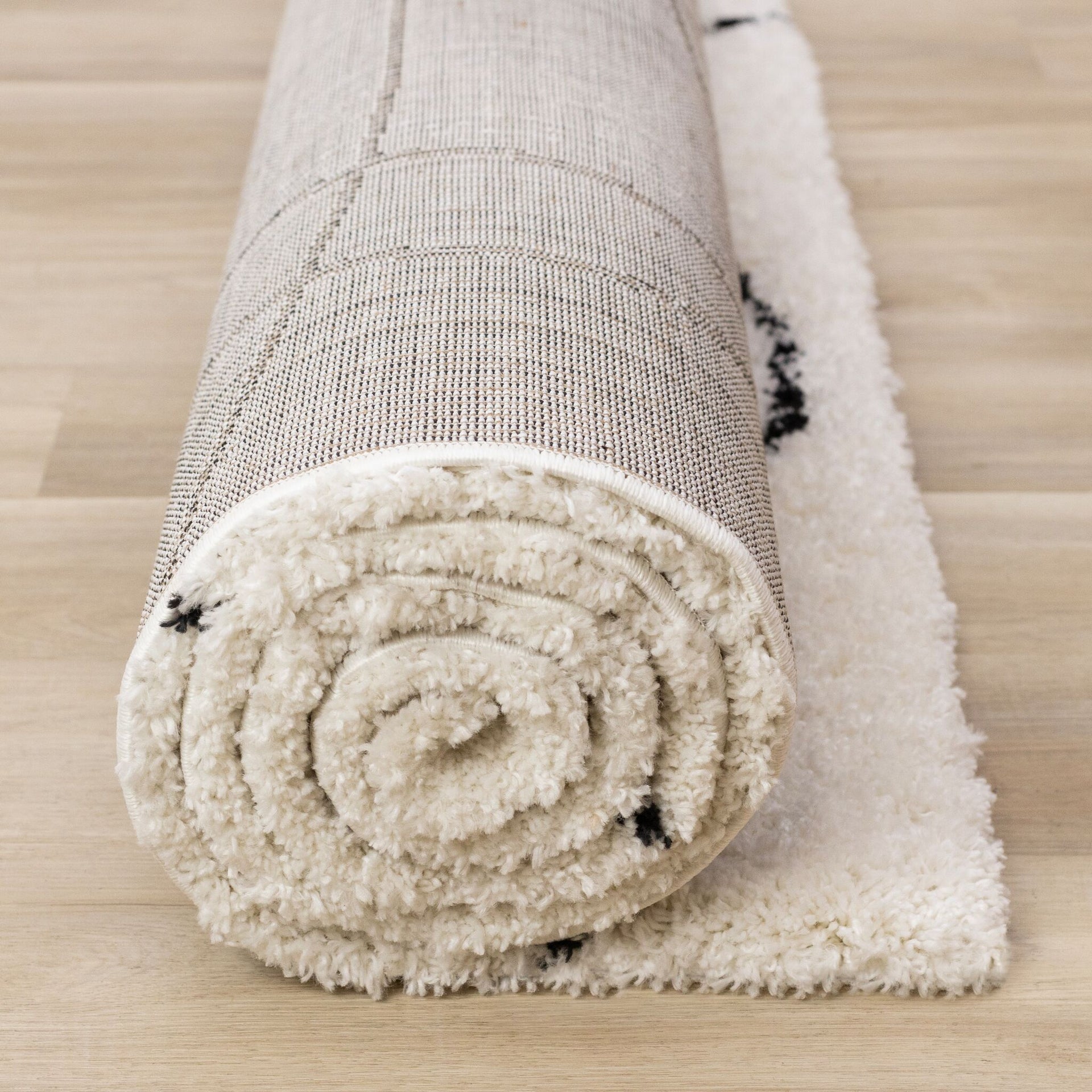Pace 6'7" x 9'6" Outlinded Shapes Area Rug - Cream, Black | Leon's