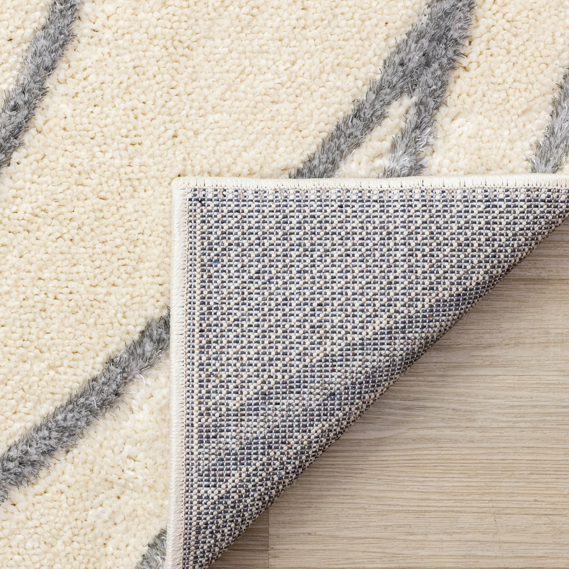 Sully 5'3" x 7'7" Circle Swirl Area Rug - Cream | Leon's