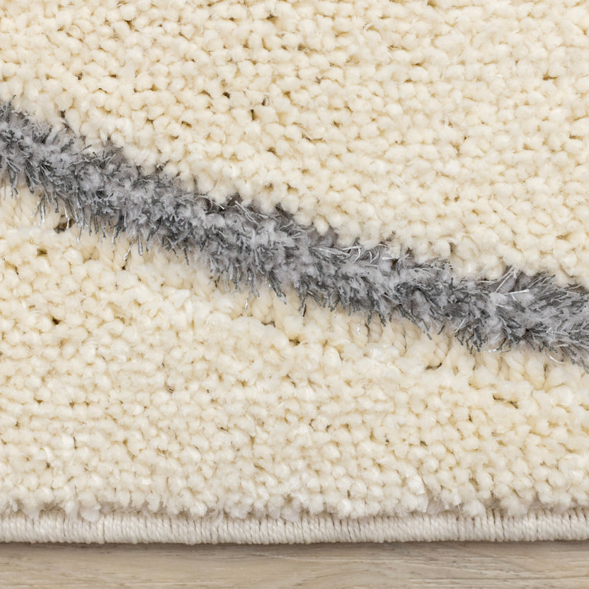 Sully 5'3" x 7'7" Circle Swirl Area Rug - Cream | Leon's