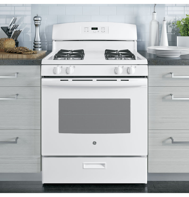 GE White Freestanding Gas Range (5.0 Cu. Ft.) - JCGBS60DEKWW | Leon's
